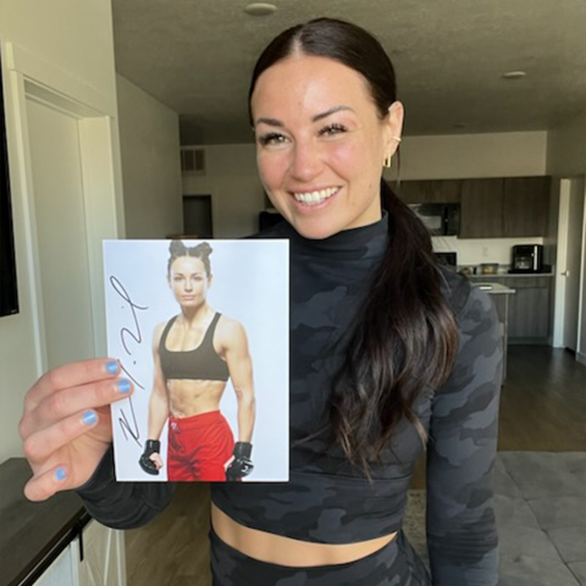 Signed Photo, Kaytlin "Katniss" Neil | MILLIONS